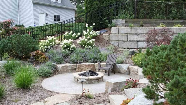 How to Build a Boulder Retaining Wall: Design Ideas, Materials & Costs ...