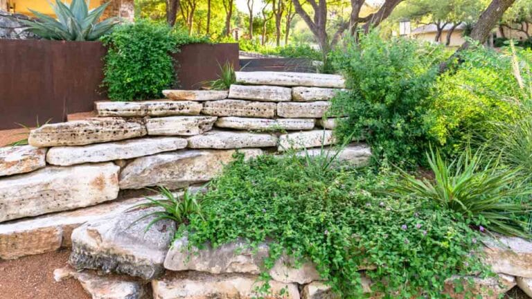 How to Build a Boulder Retaining Wall: Design Ideas, Materials & Costs ...